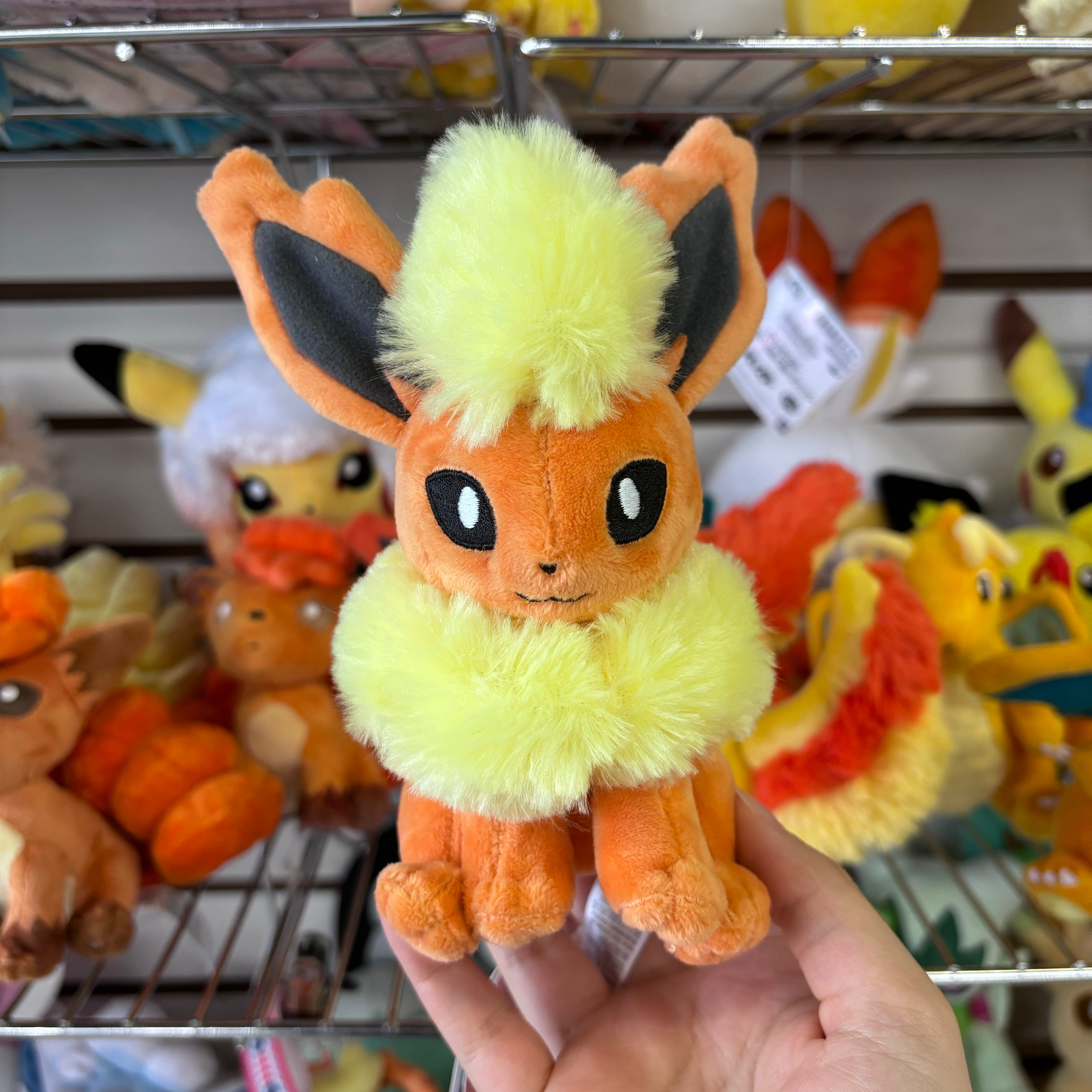 Pokemon Center: Sitting Cuties: Flareon Plush – R.E.V. Collectibles